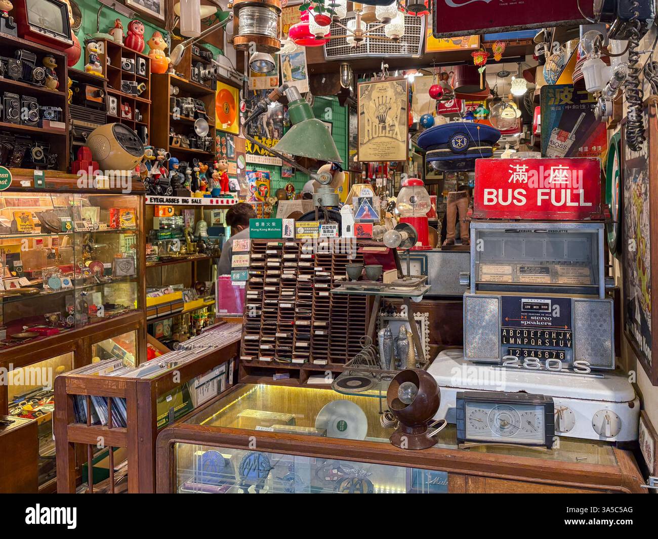 The densely packed interior of a vintage shop, filled with retro ...