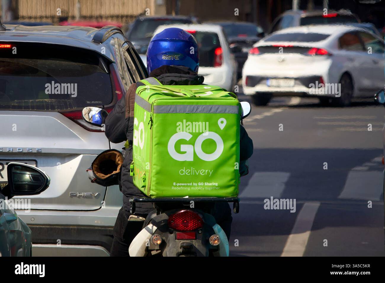 Bucharest, Romania, 22nd Mar 2025: A GO delivery, E-powered by GO ...