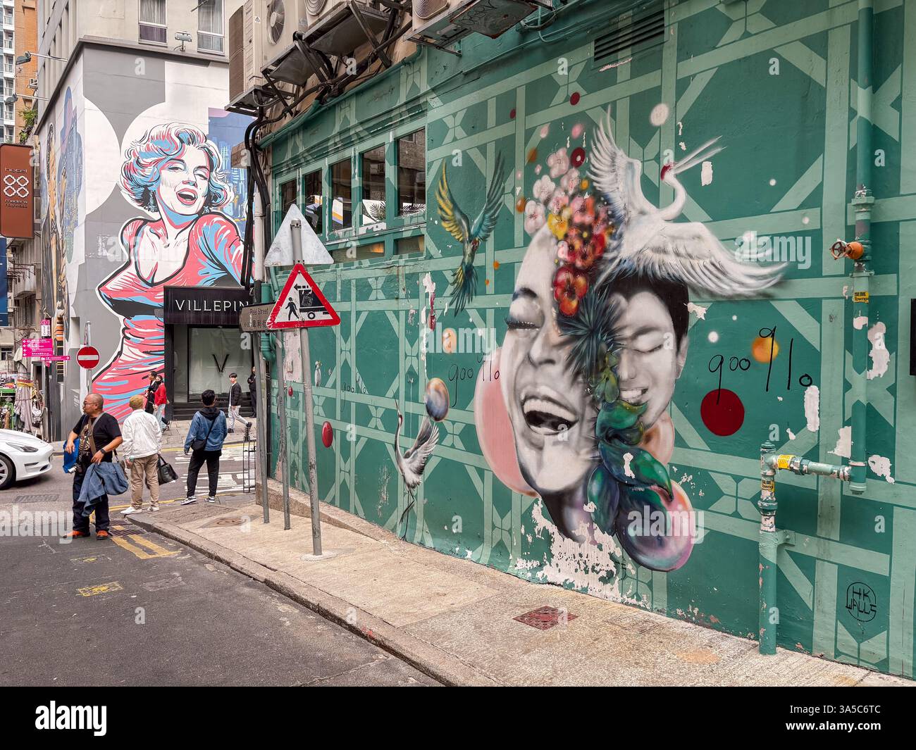Street art in Hong Kong showcasing a Marilyn Monroe mural and other ...