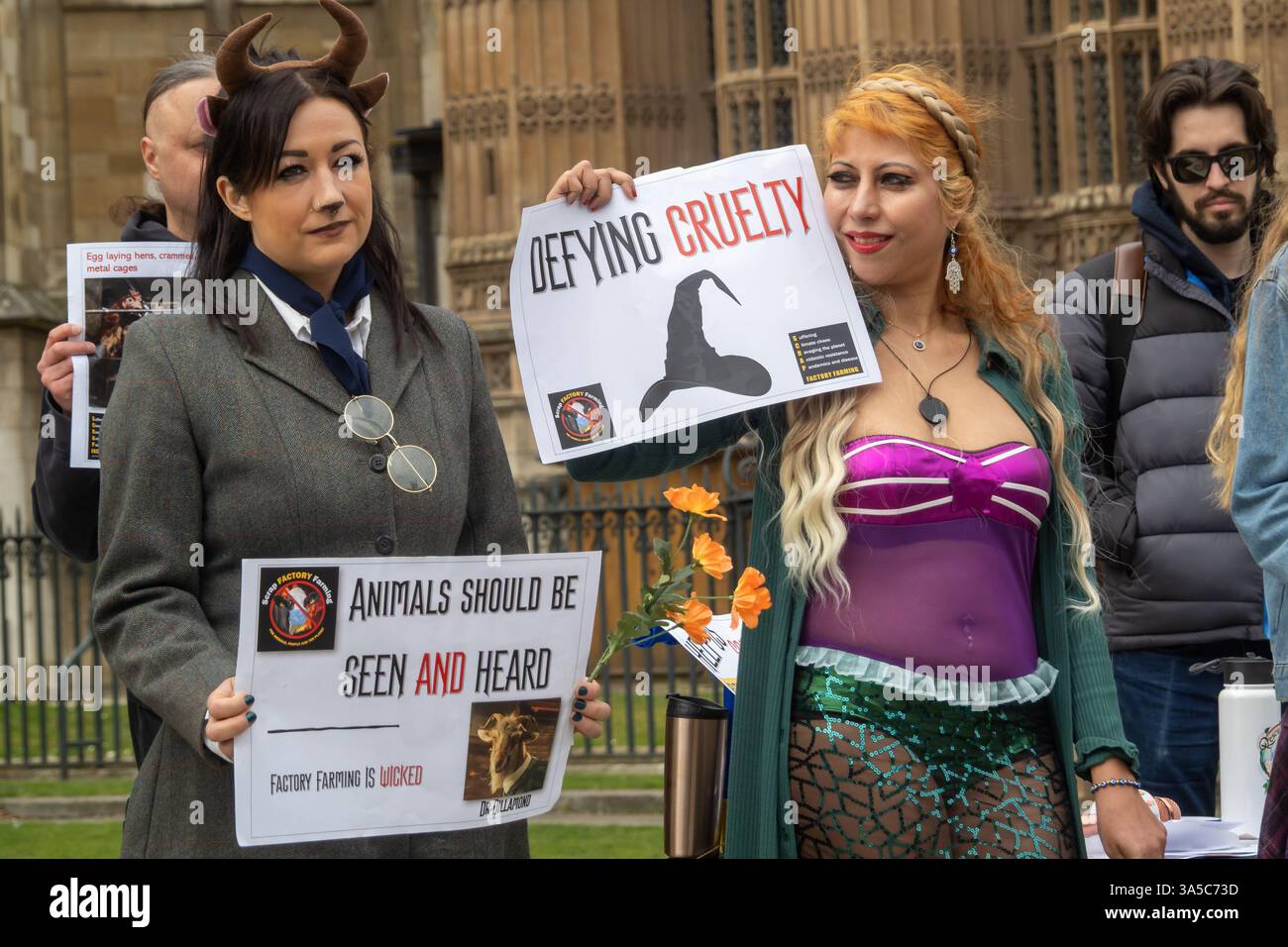 London, UK. 22 March 2025. A peaceful and colourful street theatre demo ...