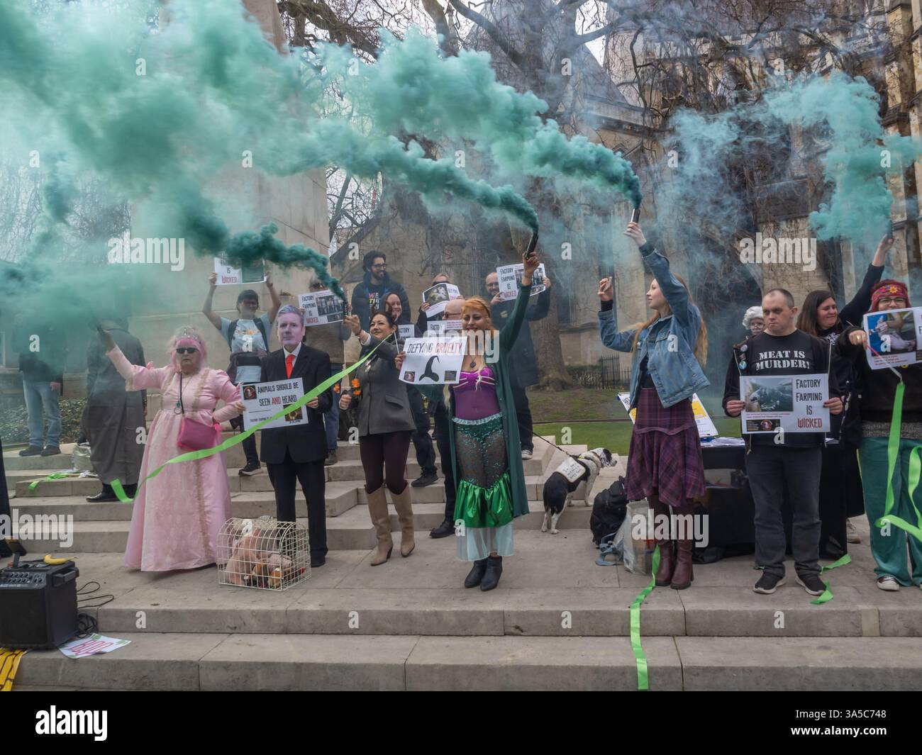 London, UK. 22 March 2025. A peaceful and colourful street theatre demo ...