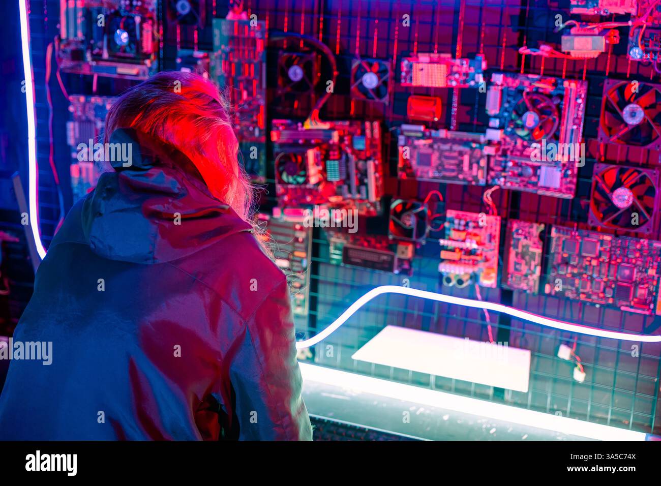 Asian woman wearing a black jacket hacking programming system check ...