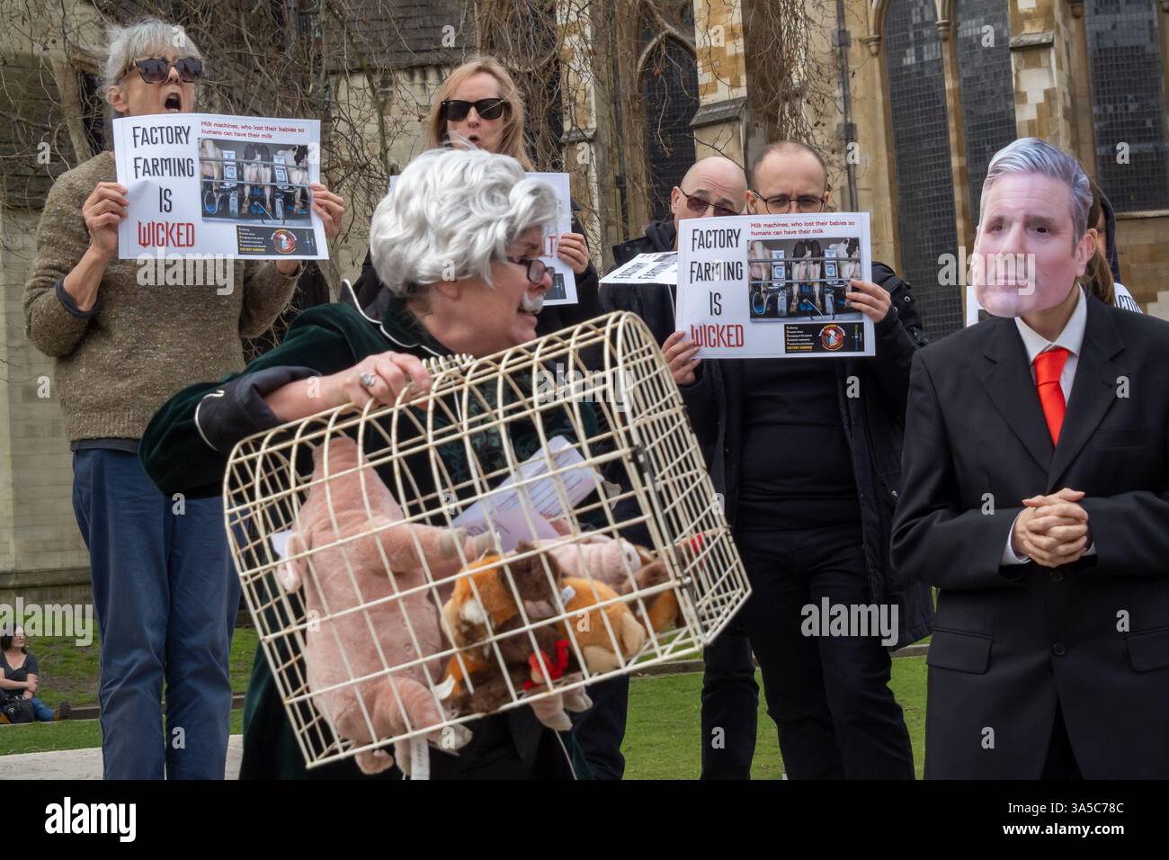 London, UK. 22 March 2025. A peaceful and colourful street theatre demo ...