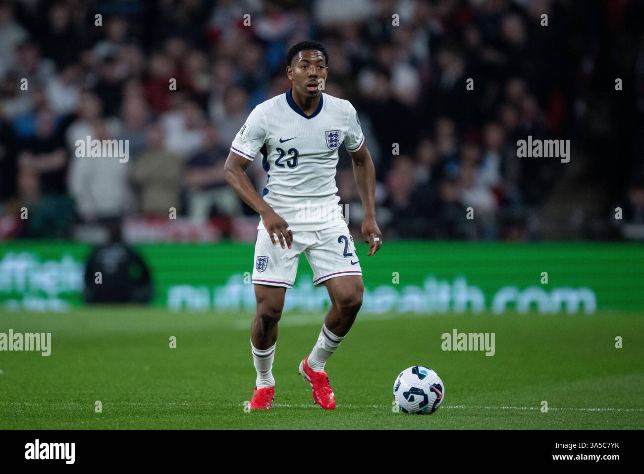 LONDON, ENGLAND - MARCH 21: Myles Lewis-Skelly of England during the ...