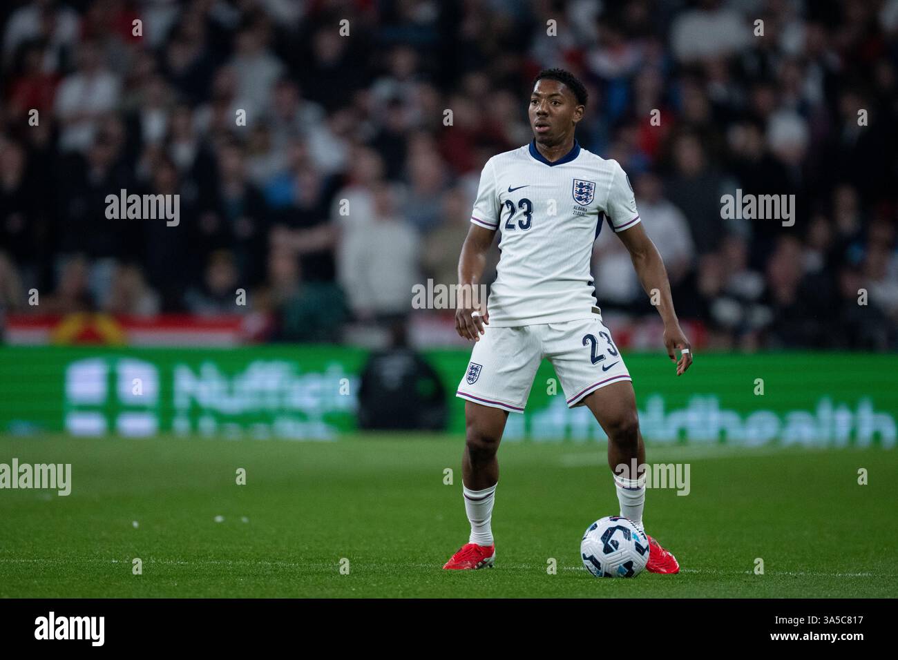 LONDON, ENGLAND - MARCH 21: Myles Lewis-Skelly of England during the ...