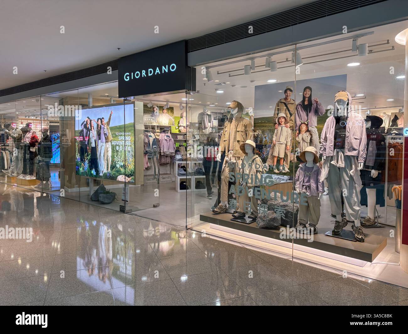 Giordano store featuring new spring collection in a shopping mall in ...