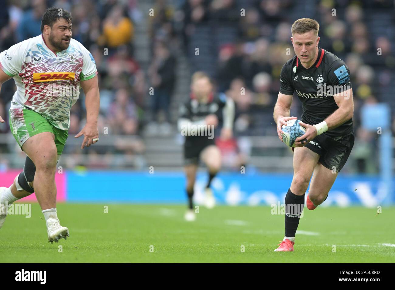 Fergus Burke of Saracens drives the ball forward during the Gallagher ...