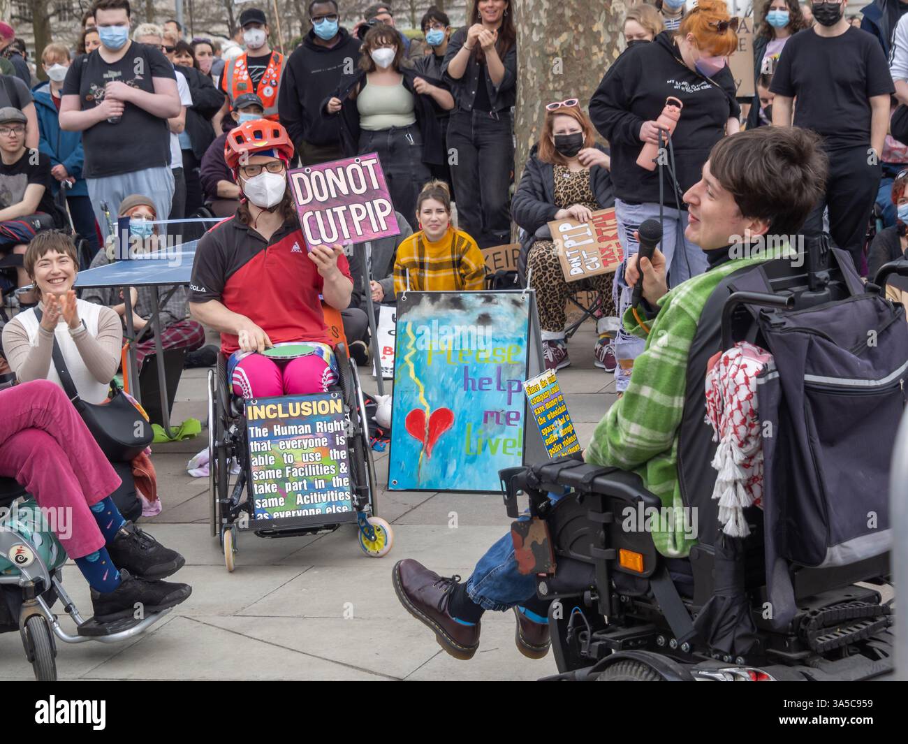 London, UK. 22 March 2025. 'Crips Against Cuts' protesters, many in ...