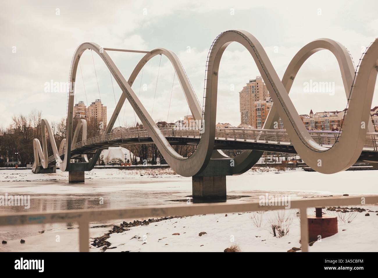 Architectural pedestrian wave bridge in Ukraine Stock Photo - Alamy