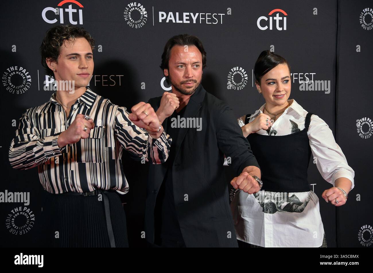 Tanner Buchanan, from left, Don Lee and Mary Mouser arrive at a ...