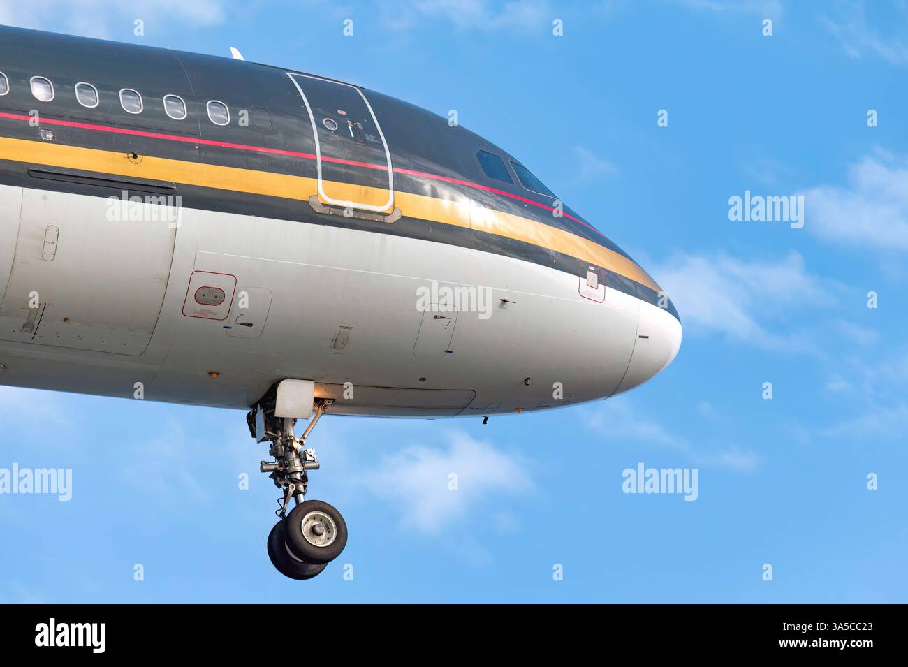 Large passenger airplane is approaching airport runway getting ready ...