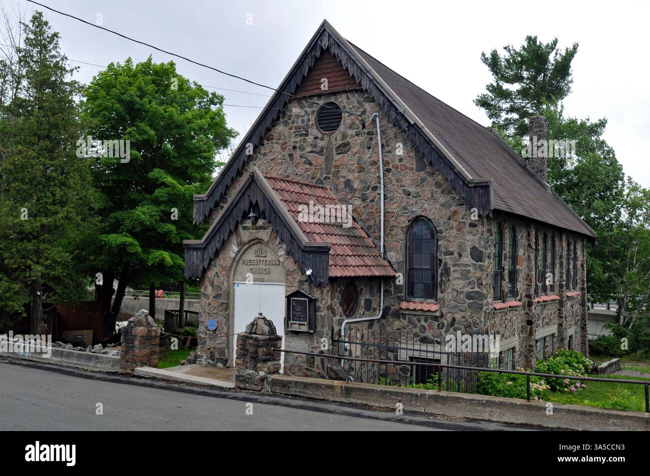 An historic former Presbyterian church built from fieldstone stands in ...