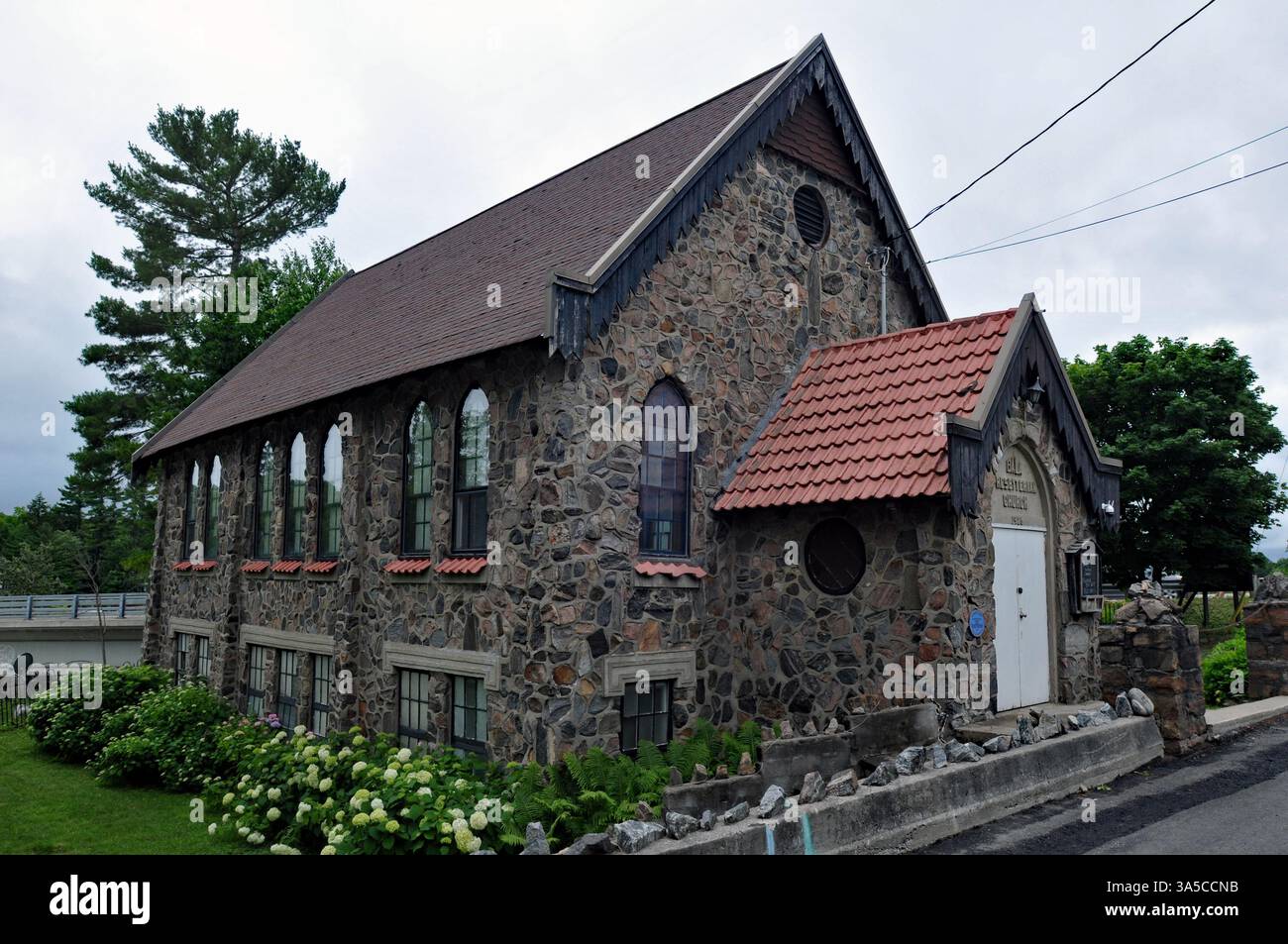 An historic former Presbyterian church built from fieldstone stands in ...