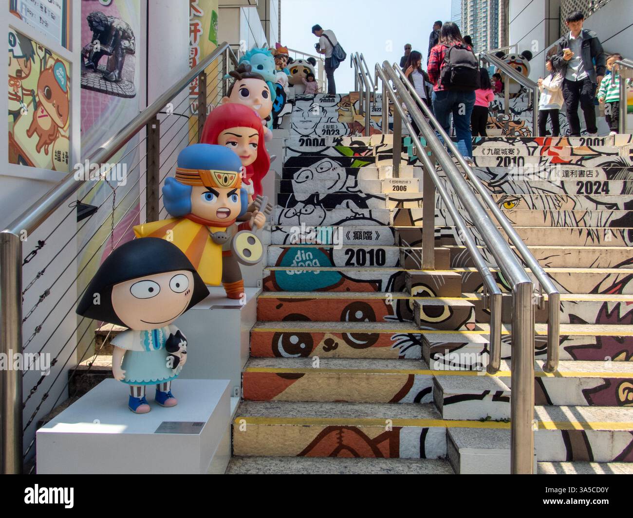 Visitors are seen touring around Hong Kong Avenue of Comic Stars in ...