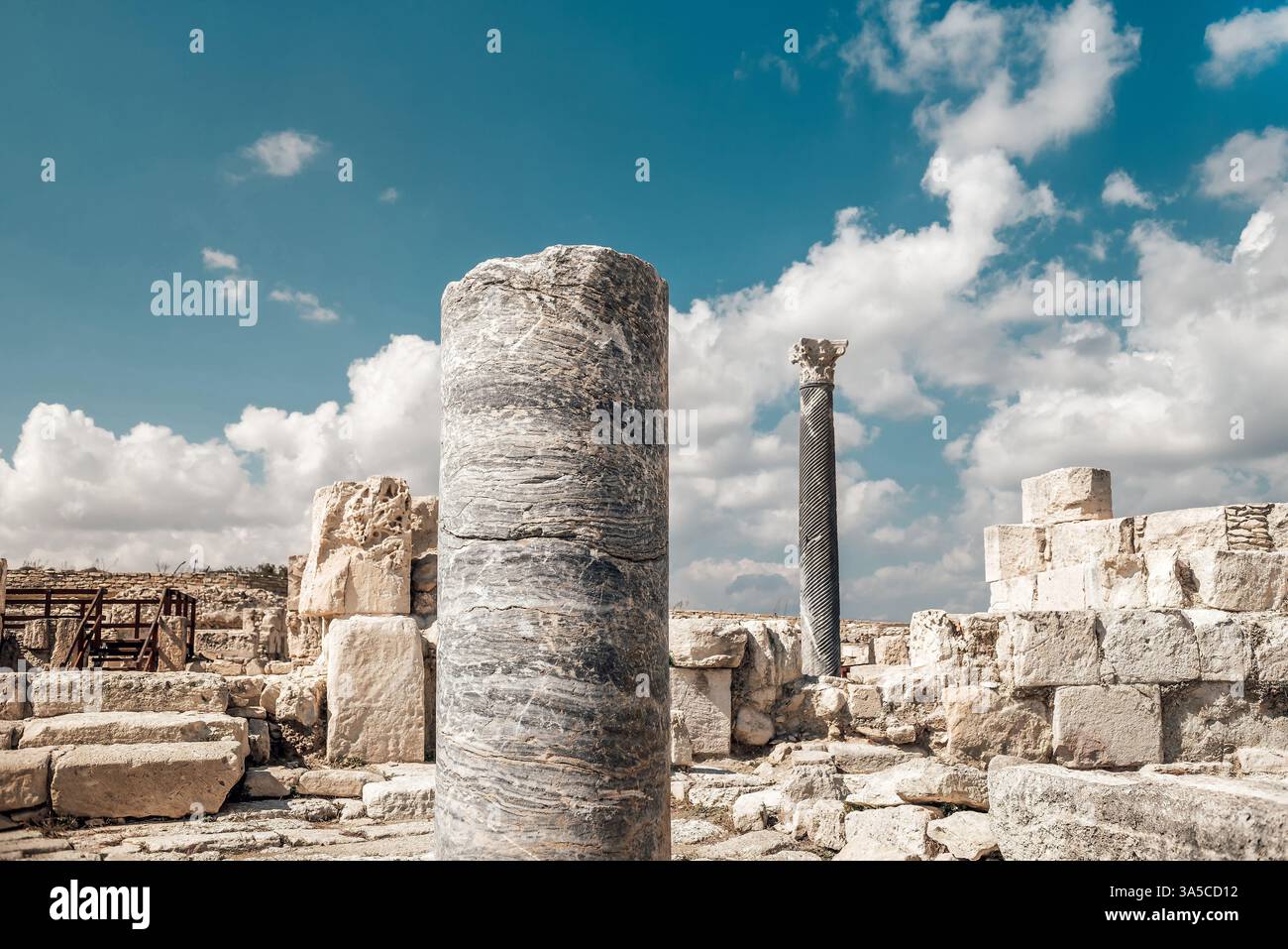 Ancient columns standing among ruins of Kourion city. Episkopi ...