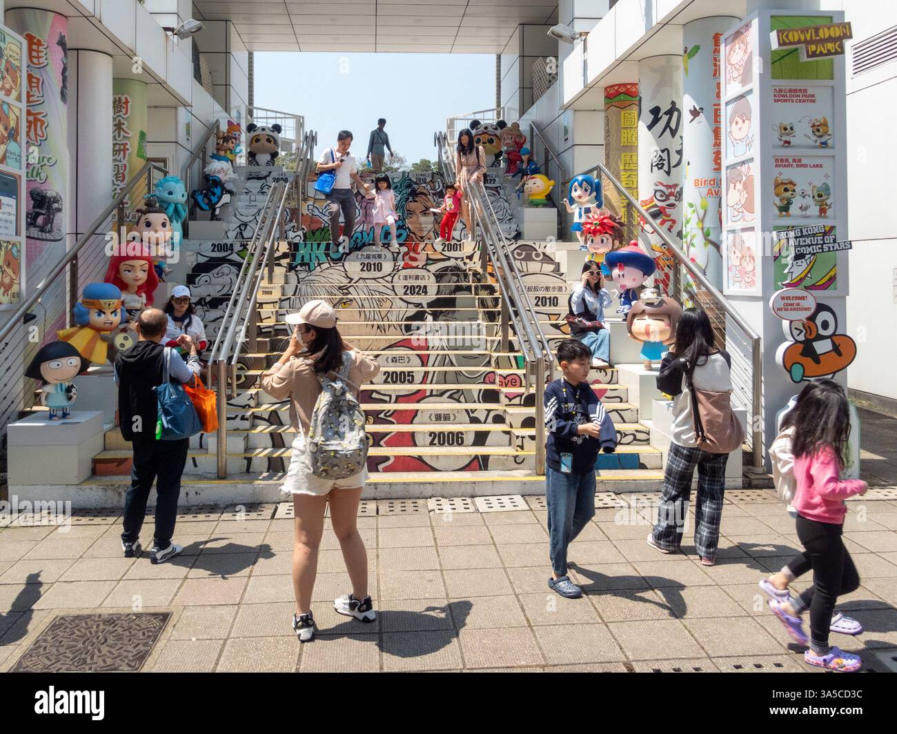 Visitors are seen touring around Hong Kong Avenue of Comic Stars in ...