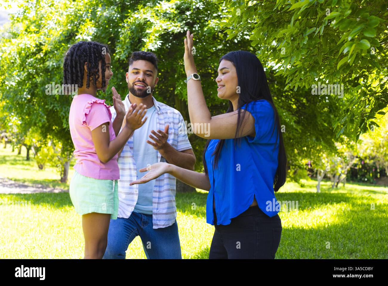 Family enjoying clapping game together hi-res stock photography and ...