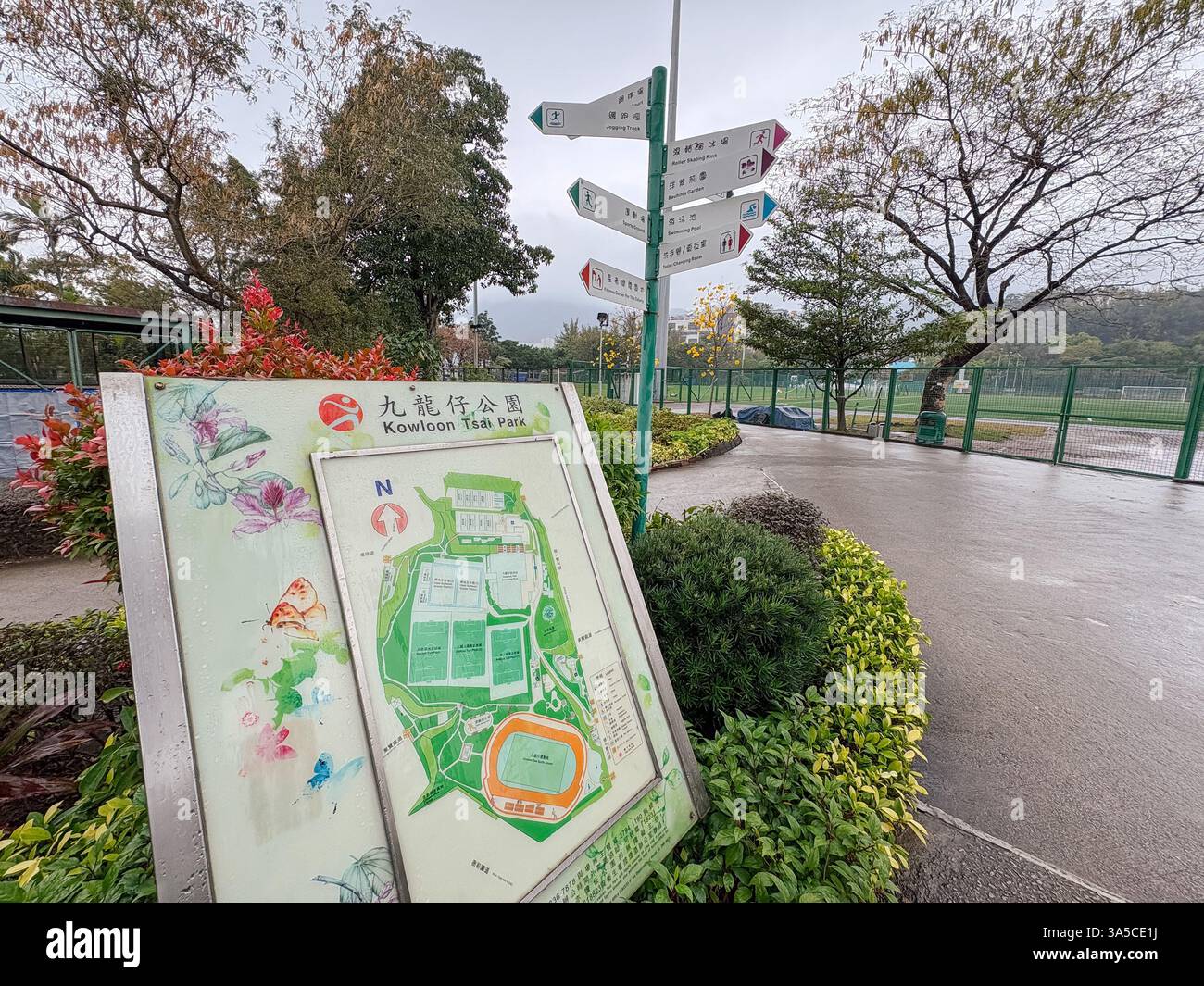 Kowloon Tsai Park map and sign in Hong Kong with directional signs ...
