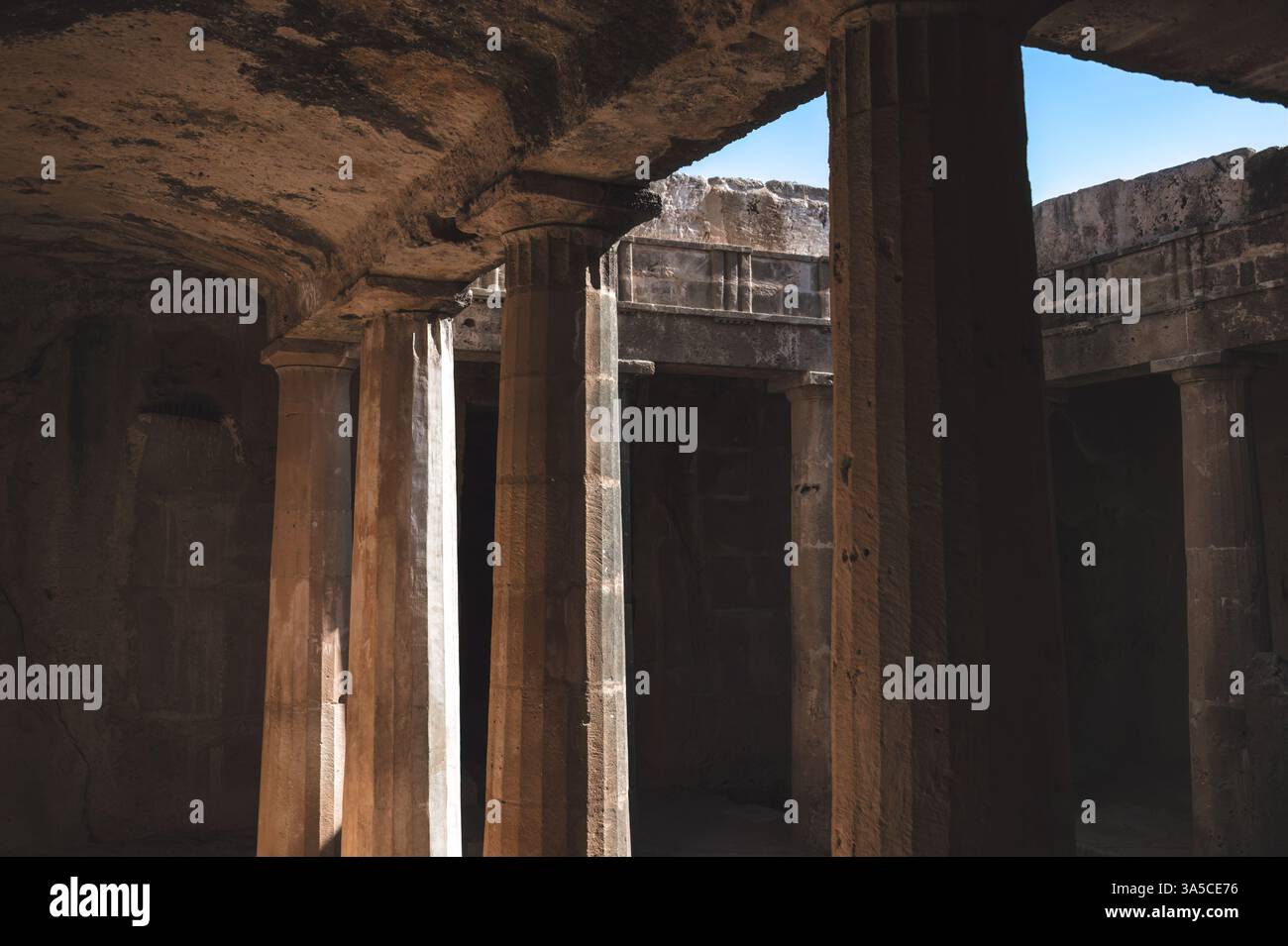 Ancient stone columns of the Tombs of the Kings, creating a captivating scene of history and ...