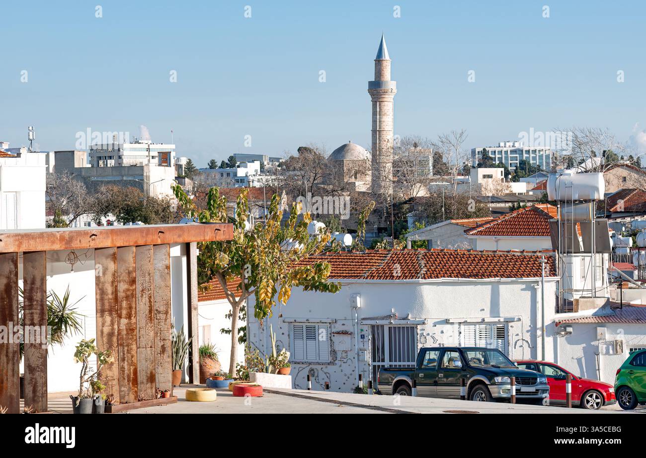 Residential neighborhood with Djami Kebir mosque minaret in Paphos ...