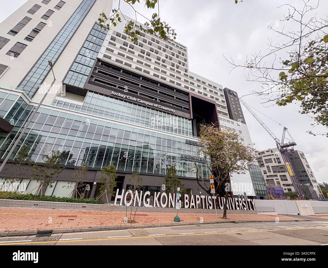 Exterior of Hong Kong Baptist University, featuring its modern campus ...