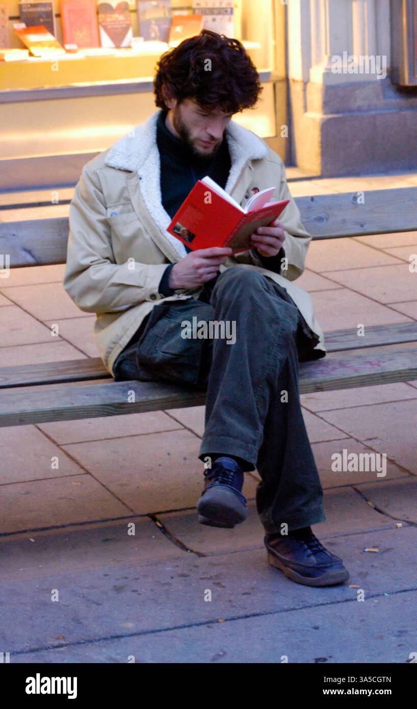 reading books or texts and literature for studying, learning or ...