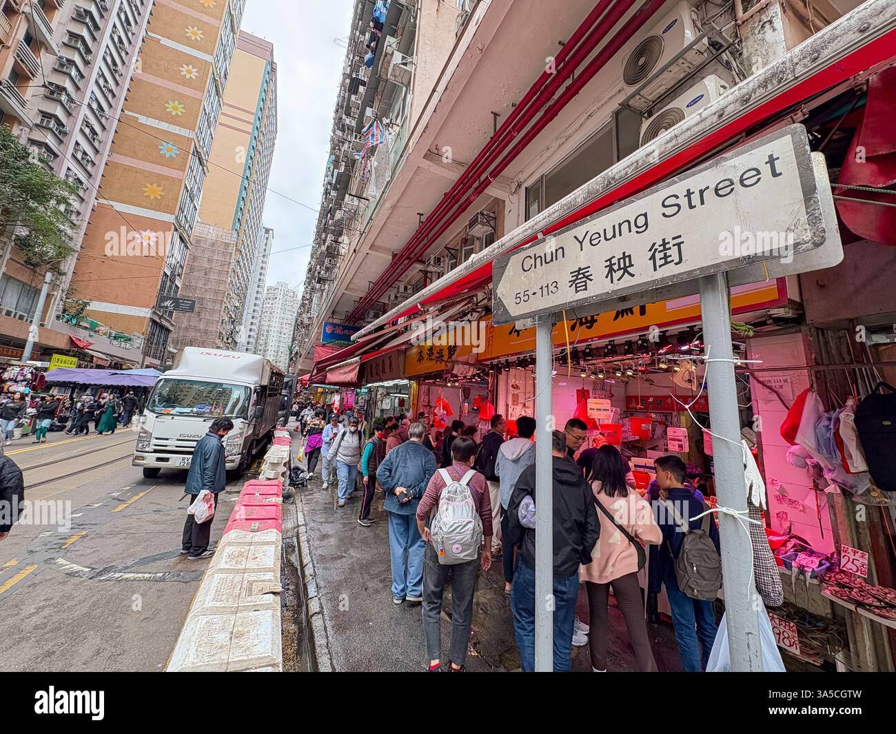 Street scene in Hong Kong on Chun Yeung Street, known for its market ...