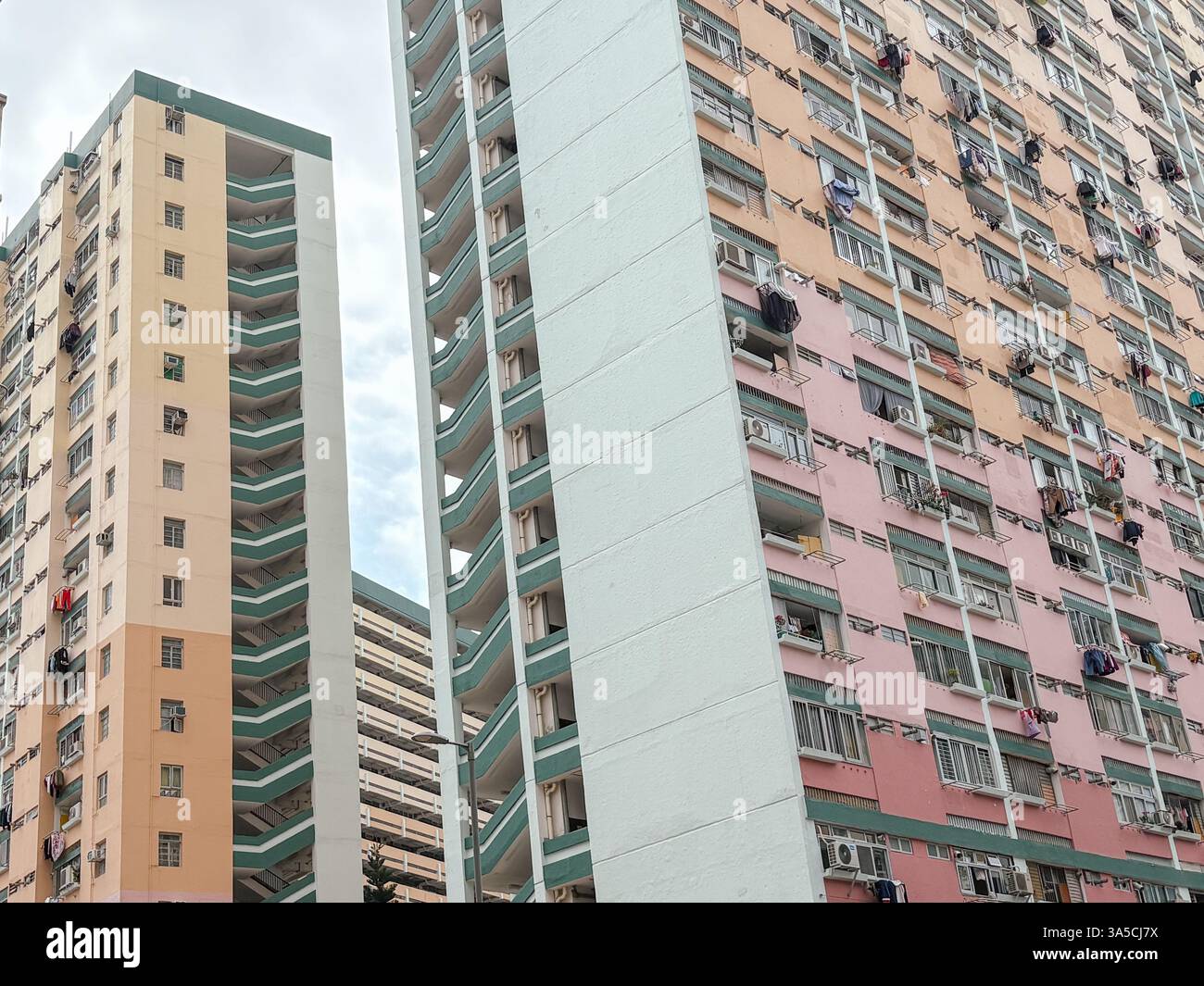 High-rise apartment buildings in Hong Kong. The architecture showcases dense urban living and ...