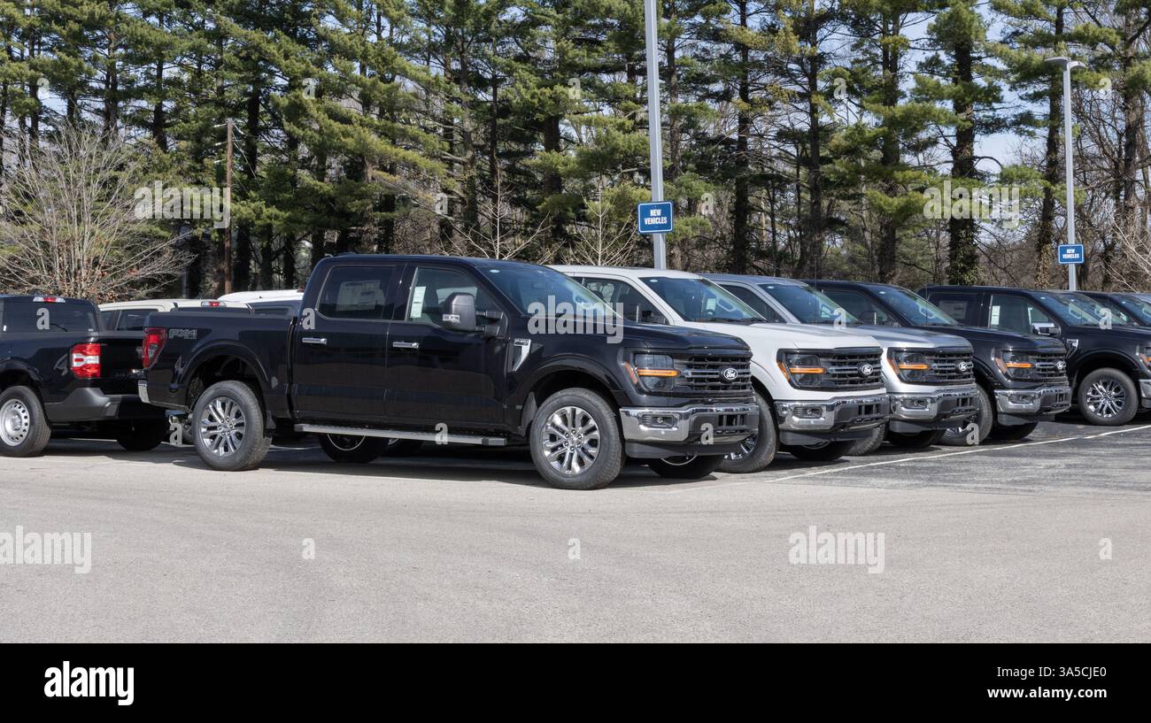 Indianapolis - March 21, 2025: Ford F-150 pickup display. Ford offers ...