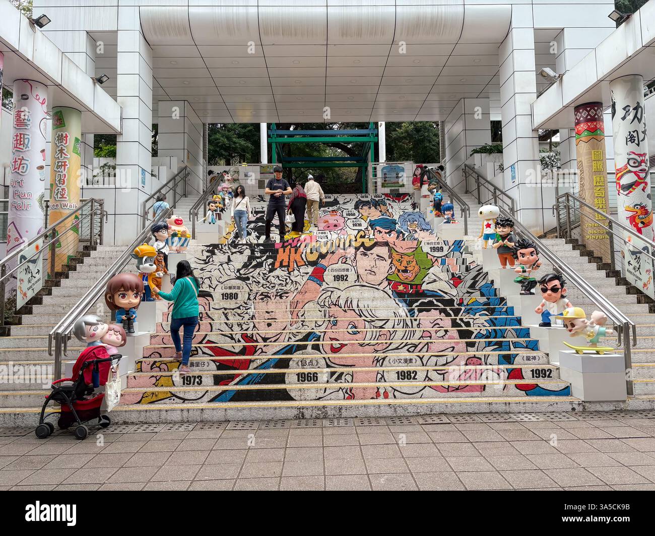 Avenue of Comic Stars in Hong Kong with the cartoon figures and a comic ...