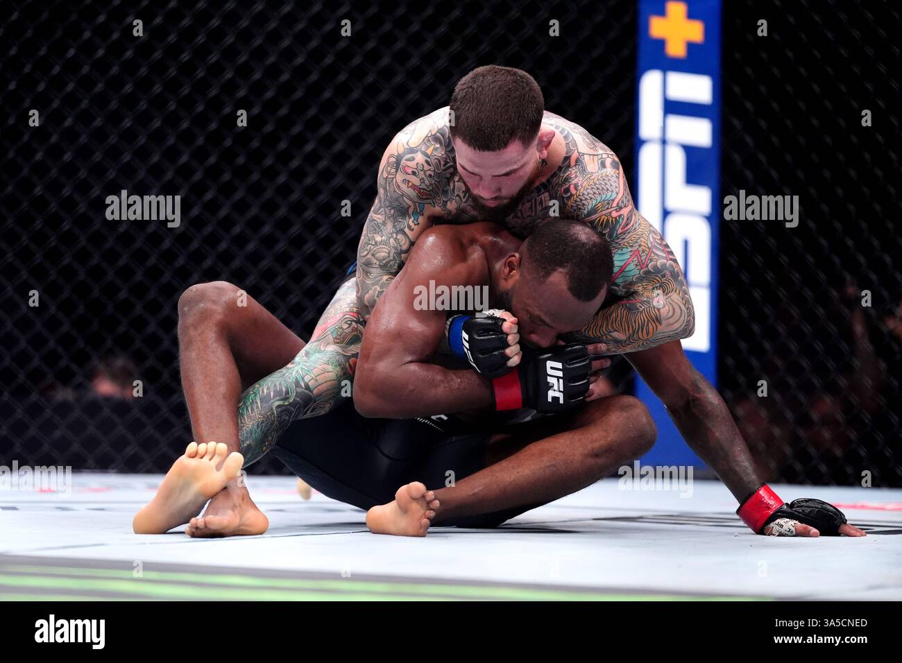 Sean Brady (left) in action against Leon Edwards during the ...