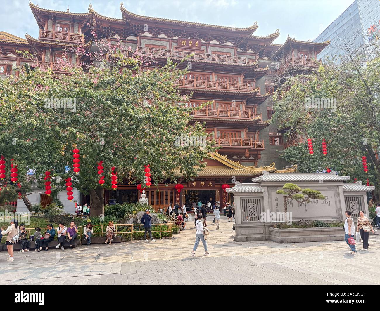 Buddhist temple on Beijing Road in Guangzhou, China. People walk around ...