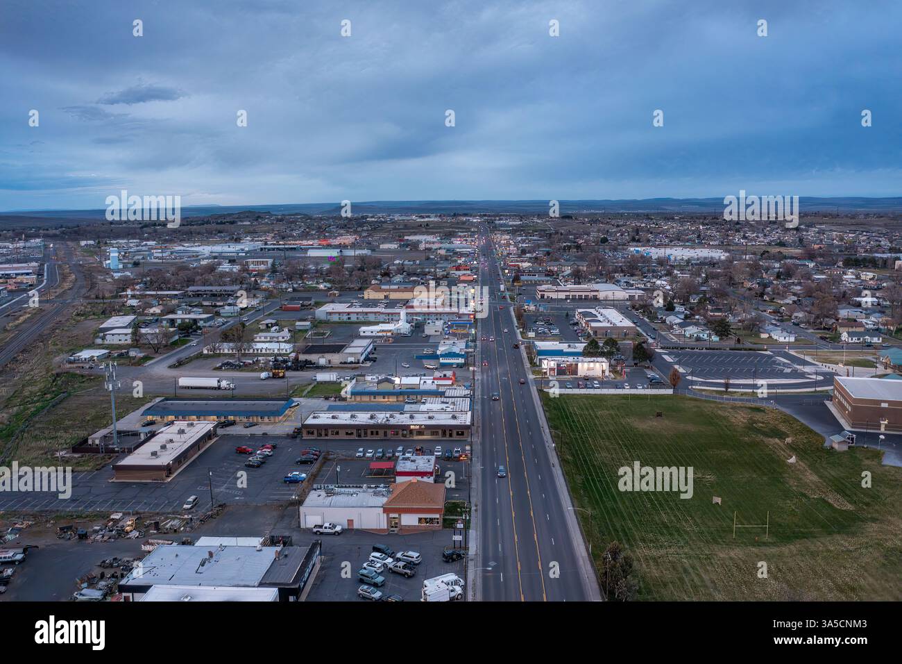 Aerial drone photo of the Eastern Oregon town of Hermiston at dusk ...