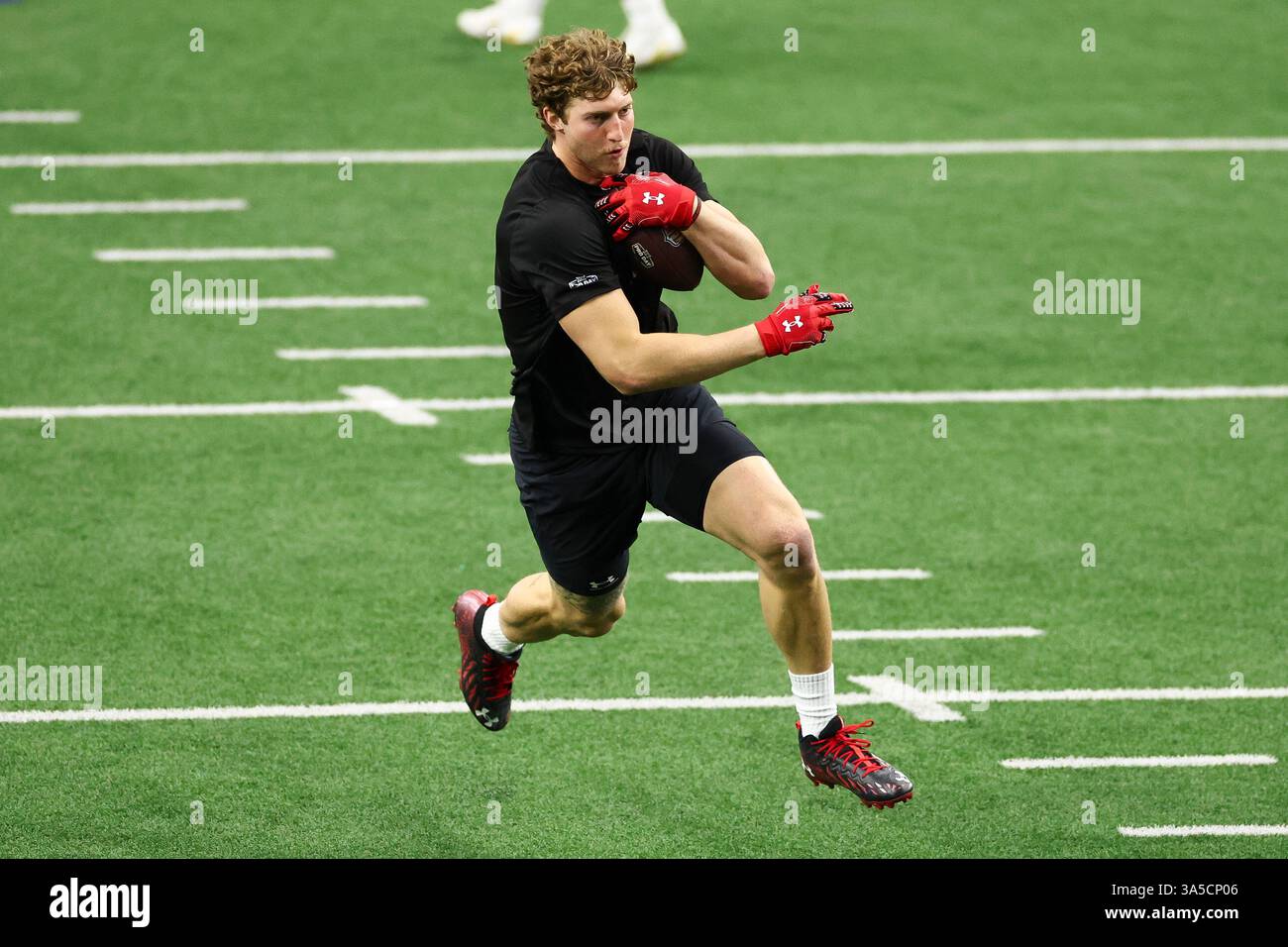 Utah tight end Caleb Lohner participates in a drill during the Big 12 ...