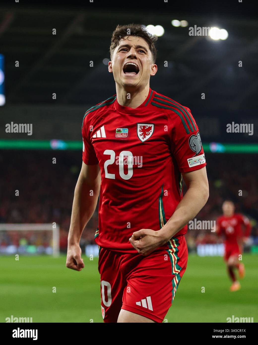 CARDIFF, WALES - 22 MARCH 2025: Wales’ Dan James celebrates his goal to ...