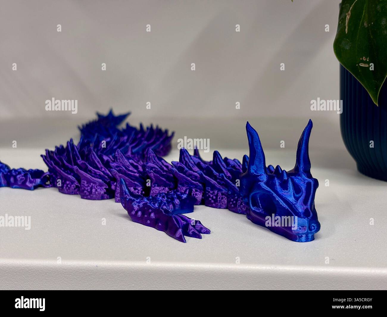 Blue and purple 3D printed dragon model, concept of technology, 3D ...