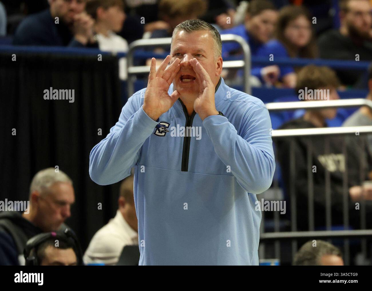 Creighton head coach Greg McDermott yells to his team in the second ...