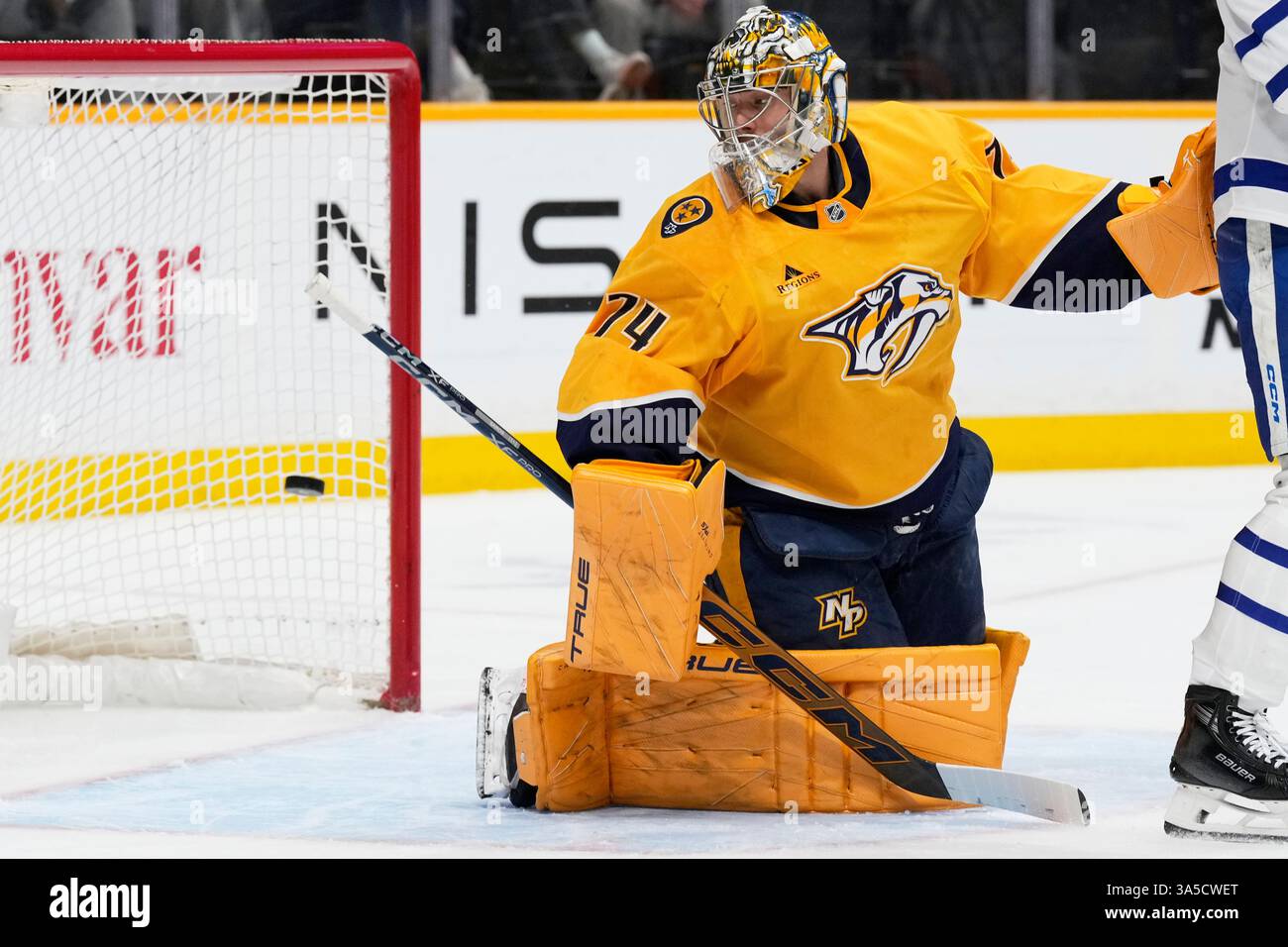 Nashville Predators goaltender Juuse Saros (74) lets a goal by the ...