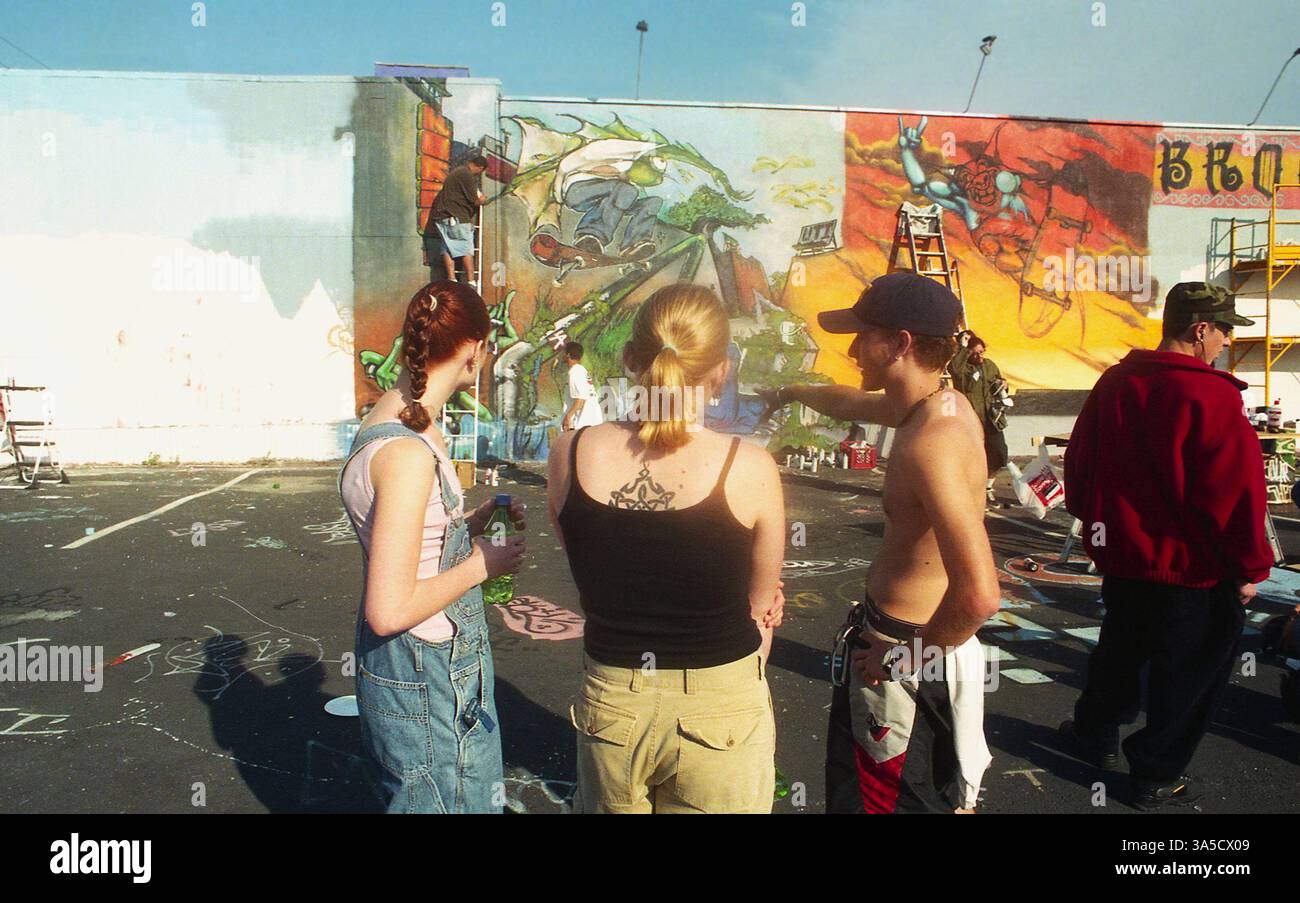 Los Angeles, CA, USA, approx. 1992. Artists painting a mural on Melrose ...