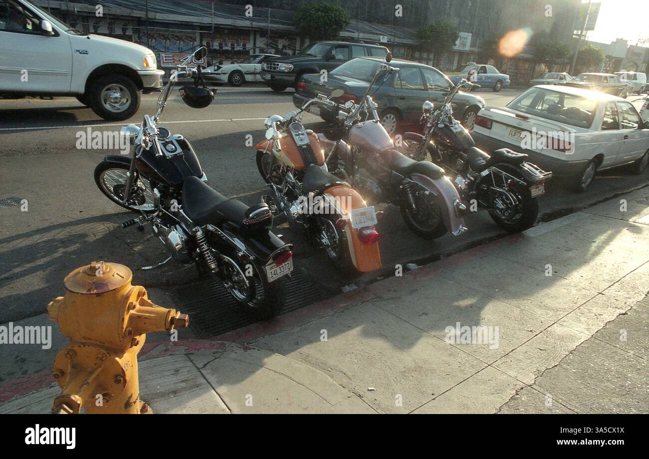 Motorcycles parked on the side of a road in Los Angeles, CA, USA ...