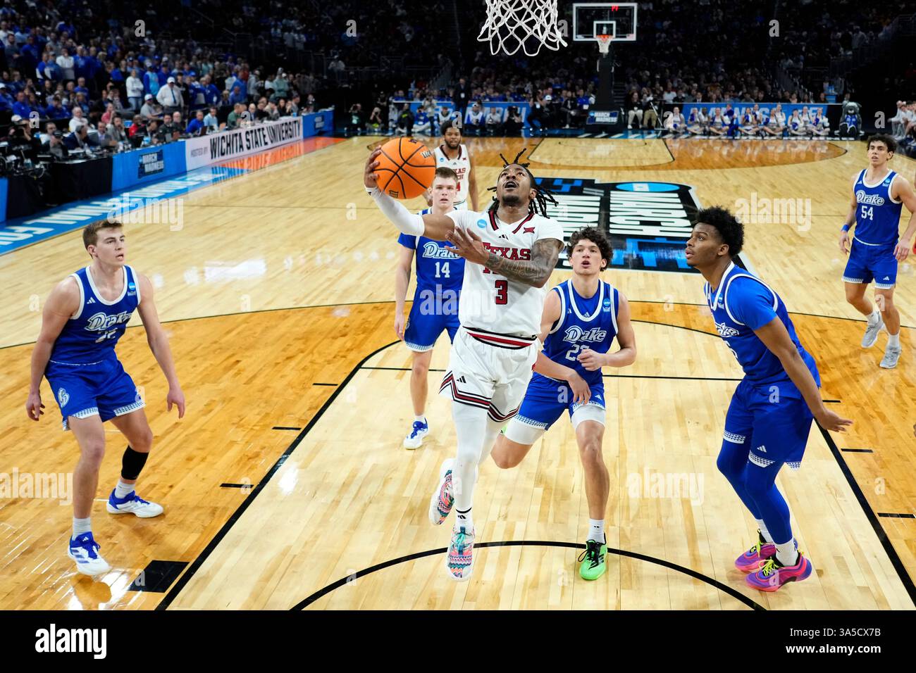 Texas Tech guard Elijah Hawkins (3) puts up a shot during the second ...
