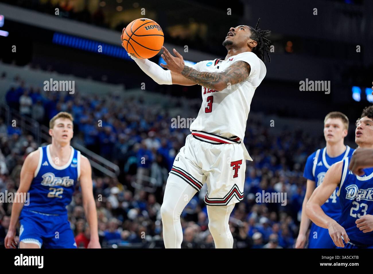 Texas Tech guard Elijah Hawkins (3) puts up a shot during the second ...