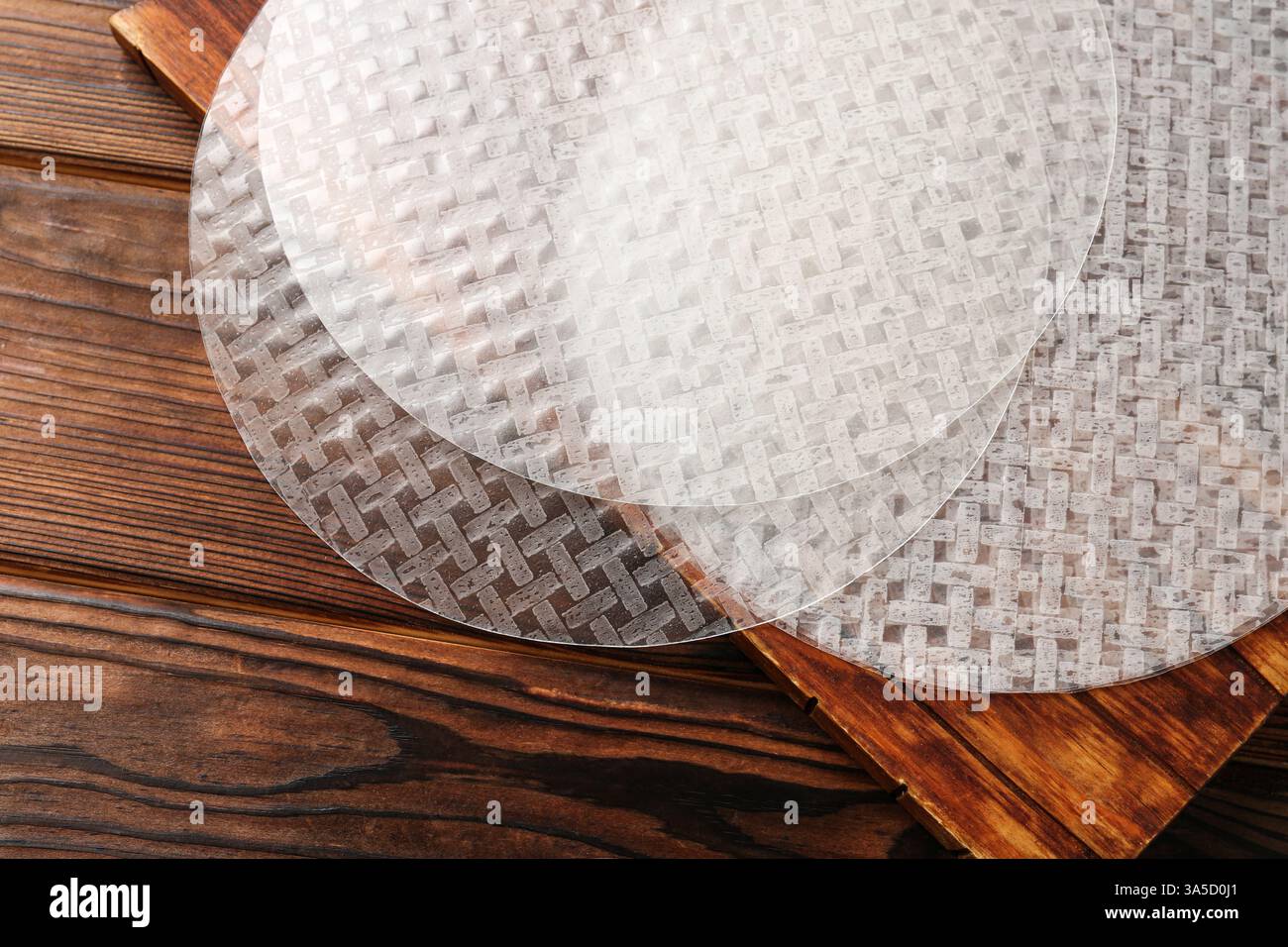 Edible rice paper sheets on wooden table, top view Stock Photo - Alamy