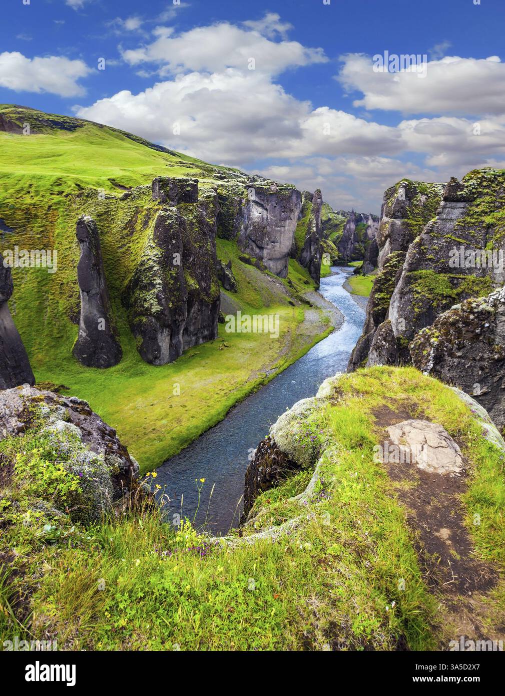 The concept of active northern tourism. Steep vertical cliffs surround ...