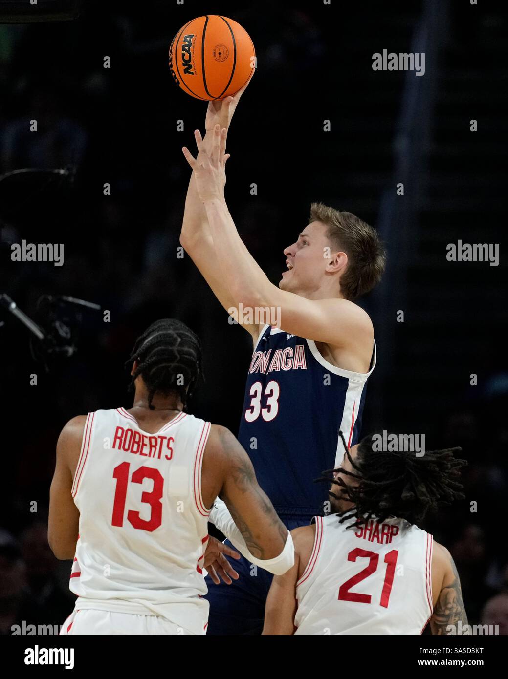 Gonzaga forward Ben Gregg (33) shoots over Houston forward J'Wan ...