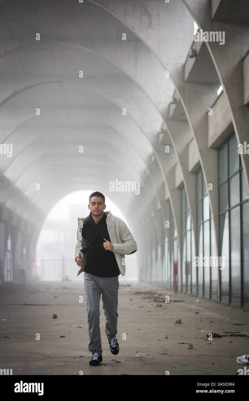 Men running towards camera hi-res stock photography and images - Alamy