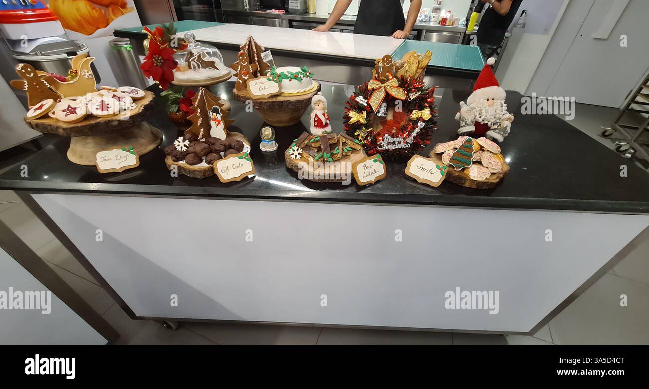 A colorful assortment of holiday baked goods is arranged beautifully on ...