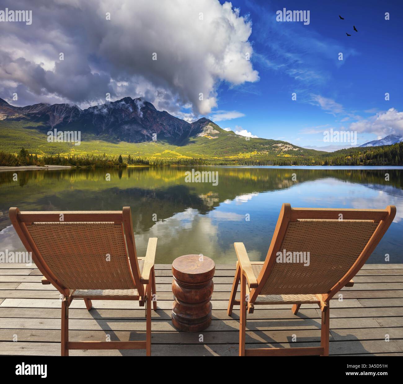 Two comfortable wooden sun beds for tourists, interconnected table ...