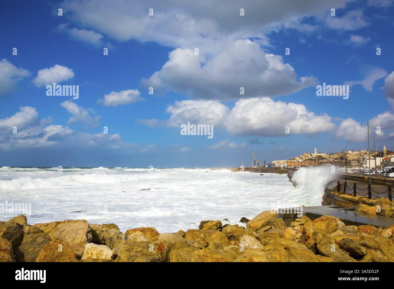 Storm on the Mediterranean Sea. Huge waves with white foam collapse at ...