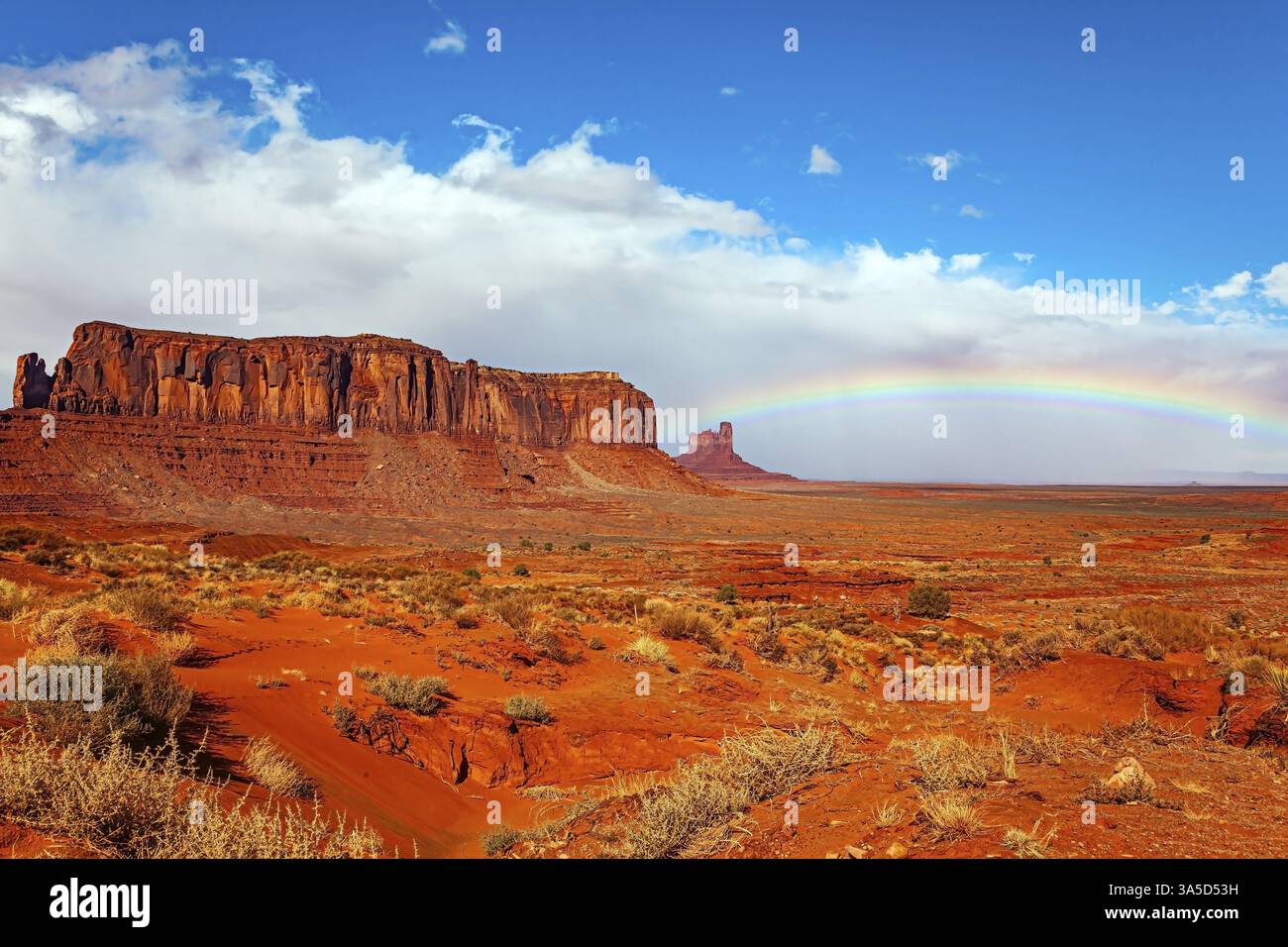 Navajo Indian Reservations. USA. Monument Valley Sentinel Mesa and the bright rainbow. Monument ...